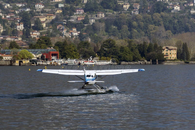 A Scenic Flight Plane on the Lake Como Editorial Photo - Image of ...