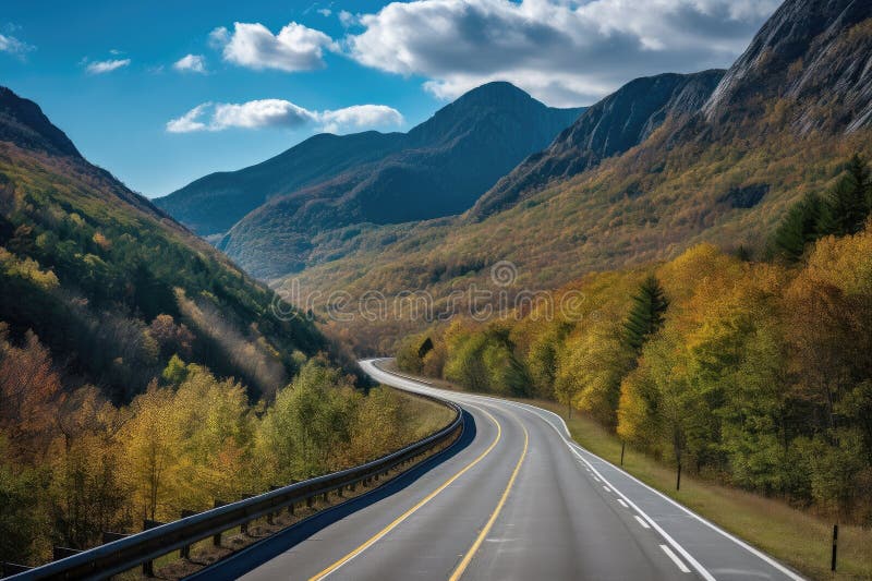 Scenic Highway with Mountain Range in the Background, Providing ...