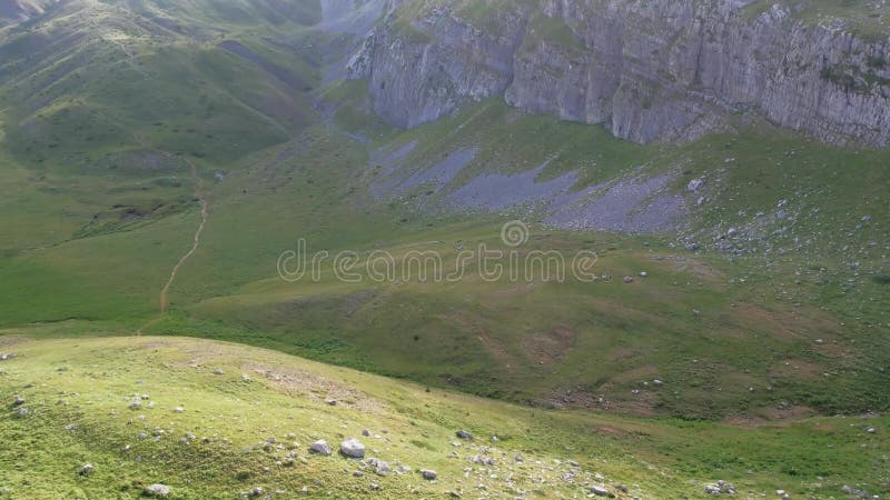 Scenic Hiking Path in a Plain with Landslides and Mountain Shadows ...