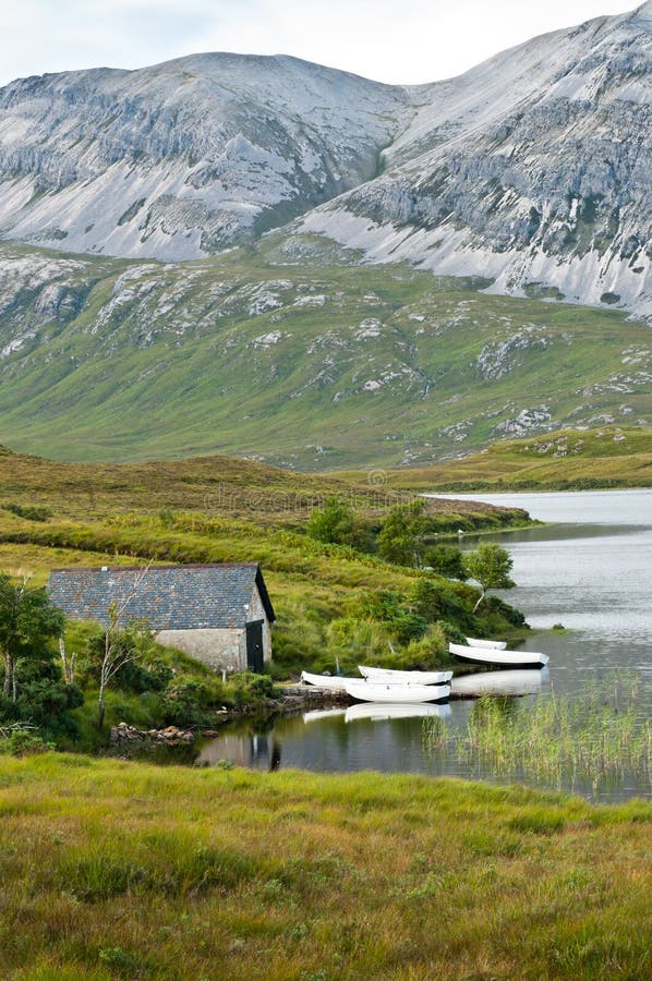 Scenic House in Valley with Sea and Boat Stock Image - Image of ...