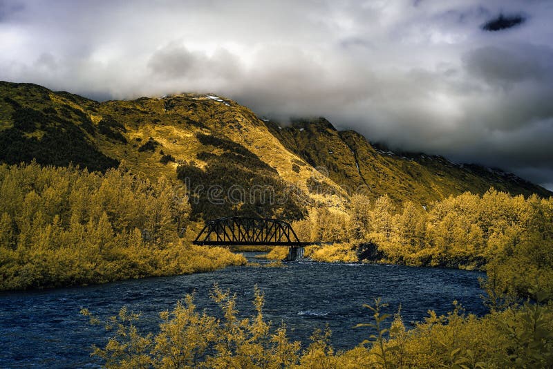 Scenic Landscape with River, Bridge, and Mountains Stock Photo - Image ...