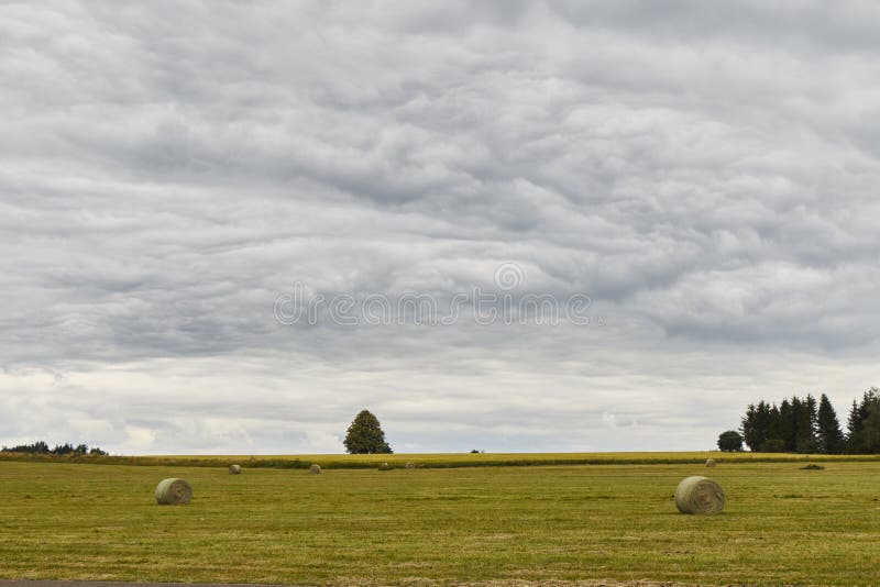 Scenic Landscape View of Hay Field with Beautiful Cloudy Sky. Stock ...