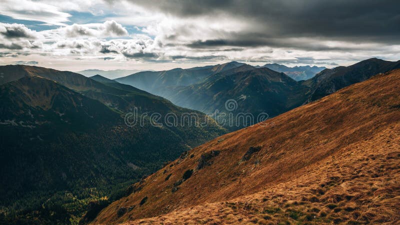Scenic Mountain Range with Sunlit Valley Stock Photo - Image of scenic ...