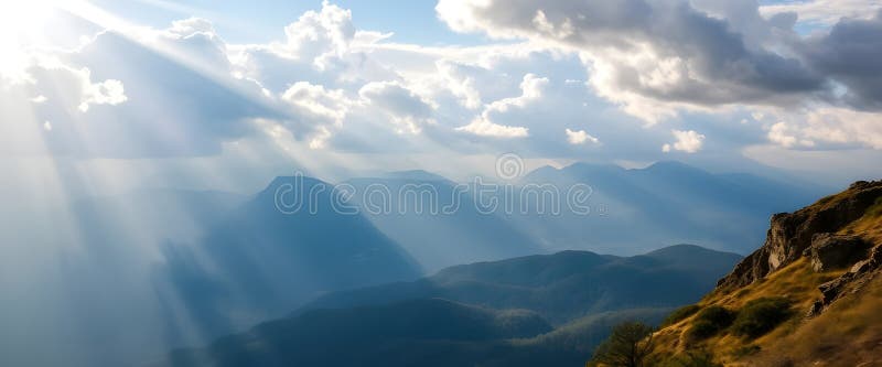 Scenic Mountain View with Sun Rays Breaking through Clouds Stock ...