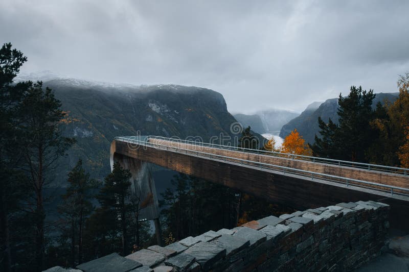 Scenic Mountain Viewpoint Showcasing a Modern Architectural Bridge in a ...