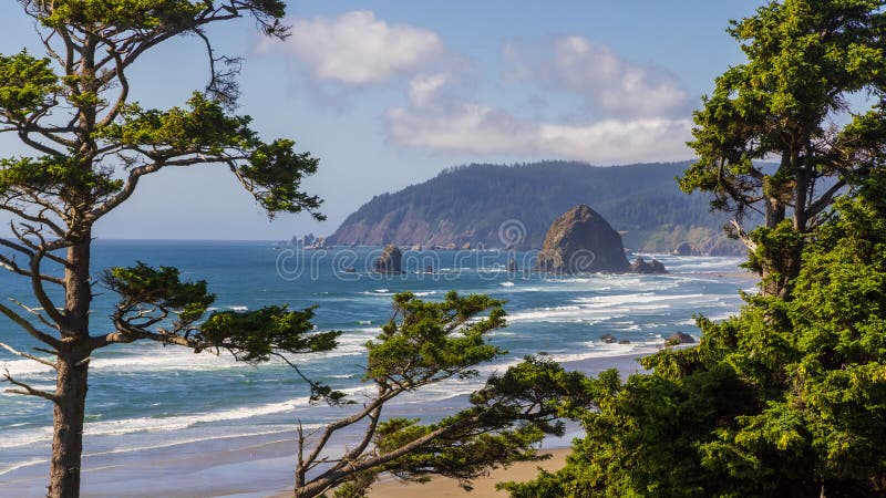 Scenic Pacific Coast with Haystack Rock in Oregon, USA Stock Photo ...