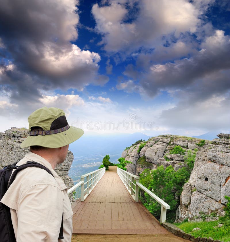 Bridge between two cliffs stock photo. Image of clouds - 39819194