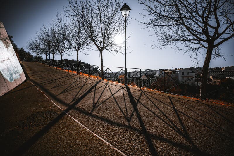 Scenic Pathway Shadows Cityscape Stock Photo - Image of light, calm ...