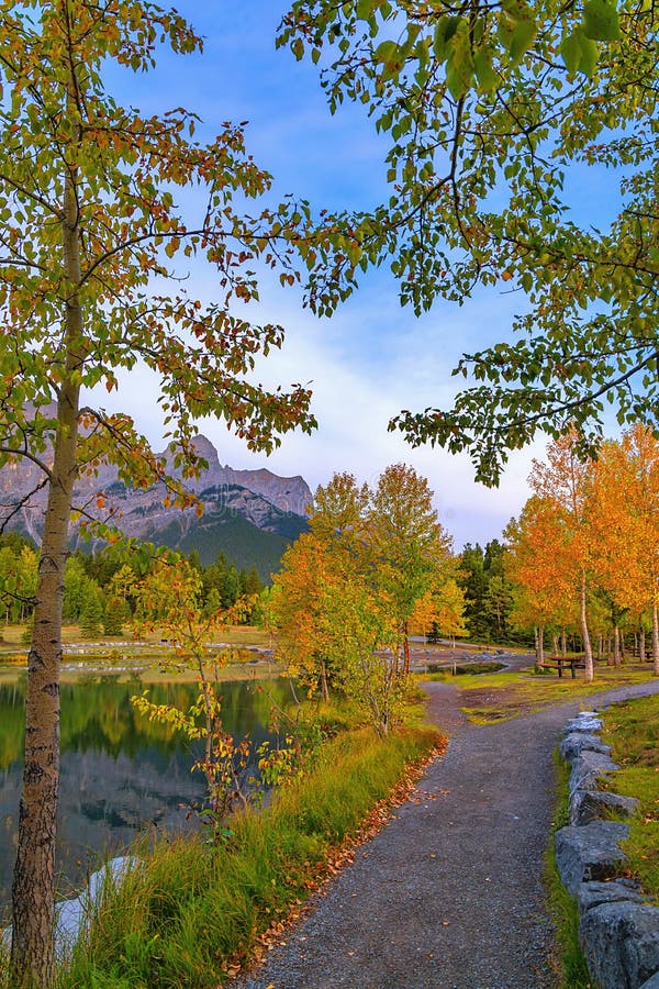 Trail through a Fall Park stock photo. Image of quarrylake - 231244926