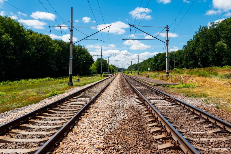 Scenic Railroad in Rural Area and Blue Sky with White Clouds in Summer ...