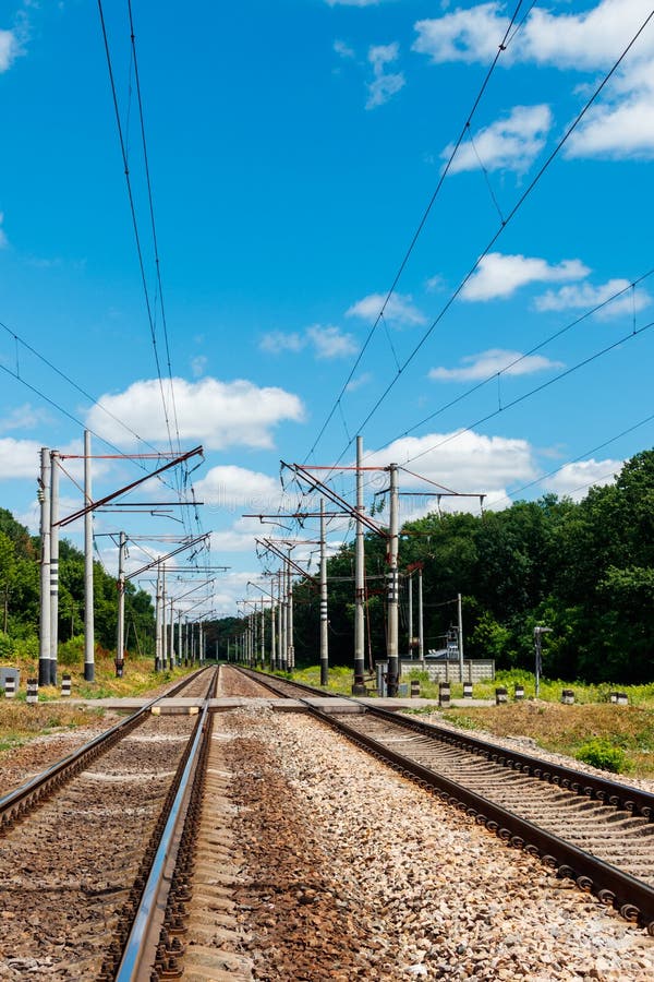 Scenic Railroad in Rural Area and Blue Sky with White Clouds in Summer ...