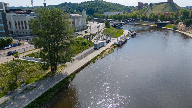 Scenic Riverside with Modern Bridge and Historical Buildings Stock ...