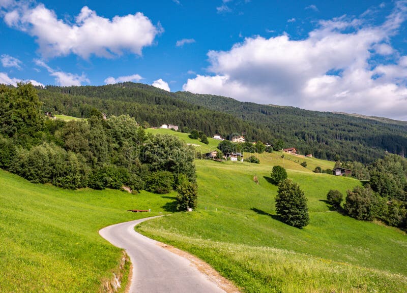 Scenic road in the Alps stock image. Image of meadow - 225940229