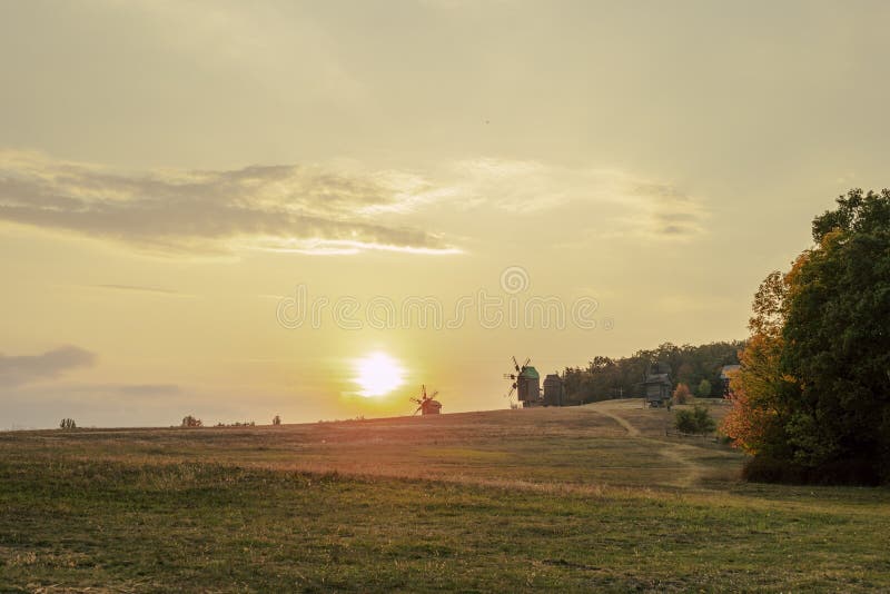 Scenic Rural Landscape in the Sunset Light with Mills on the Horizon ...