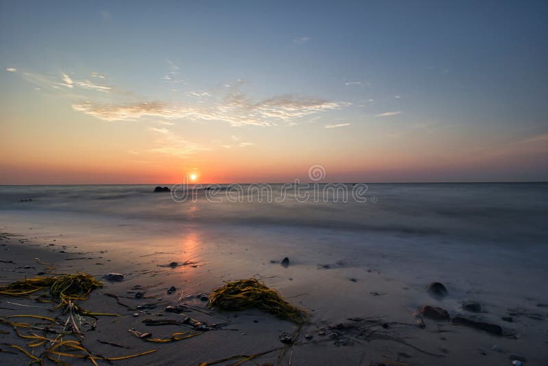 Scenic Shot of the Reflection of the Setting Sun on the Surface of the ...