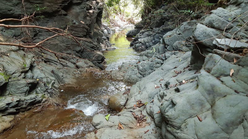 Scenic Shot of a River Flowing through Rocks, Cool for Background Stock ...
