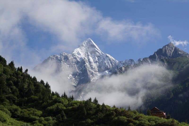 Scenic Shot of Sharp Mountain Peaks Covered in Snow and Surrounded by ...
