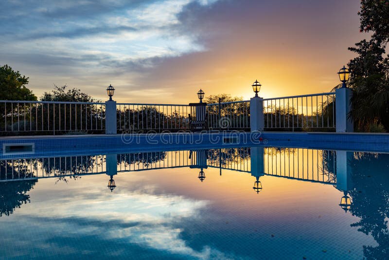 Scenic Sunrise with Reflection in Pool Stock Photo - Image of ...
