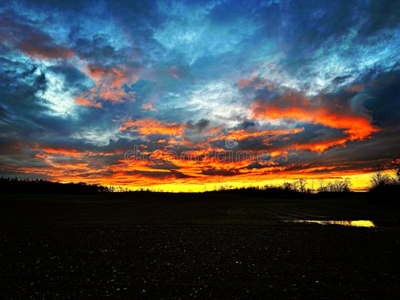 Scenic Sunset Cloudscape Over a Countryside Landscape Stock Photo ...