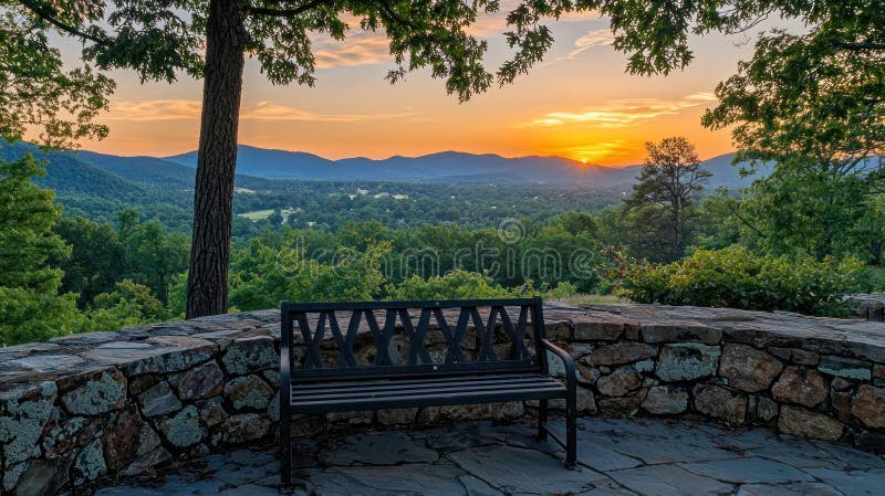 Scenic Sunset Over the Mountains Seen from a Stone Patio with a Bench ...