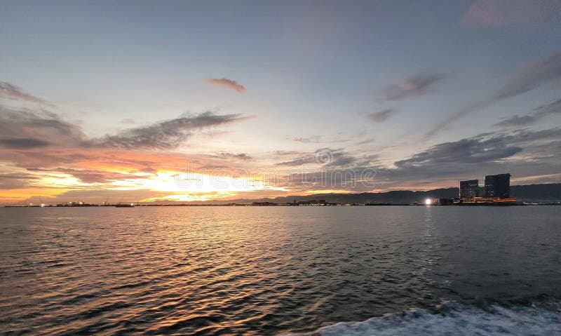Scenic Sunset Over the Ocean at the Harbor of Cebu Stock Photo - Image ...