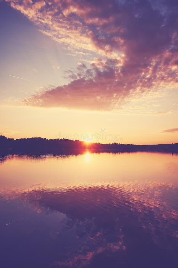 Scenic Sunset Over the Water, Color Toning Applied Stock Photo - Image ...