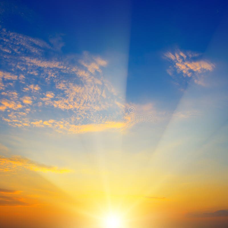 Scenic Sunset with Sun Rays Against Bright Blue Sky Stock Image - Image ...