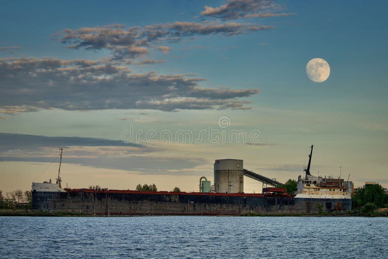 Scenic Sunset View of a Port and a Full Moon Stock Image - Image of ...