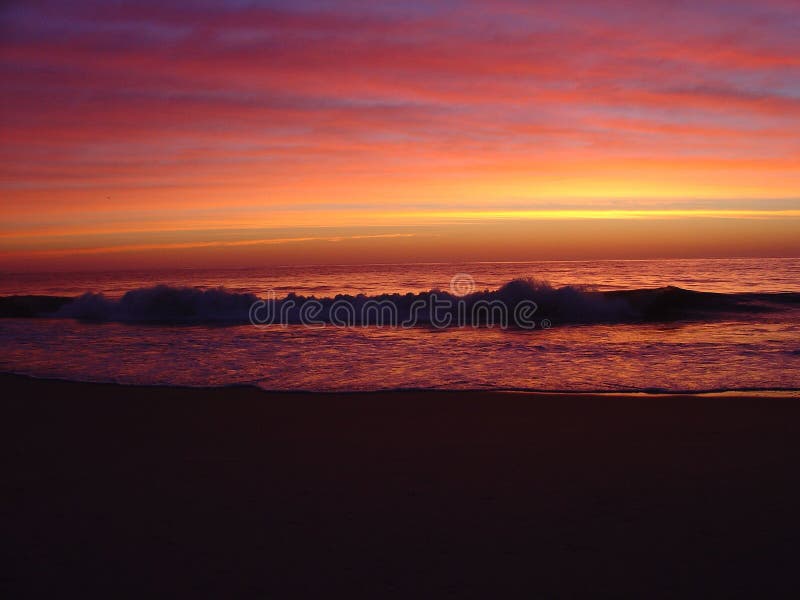 Scenic View of a Beachfront at Sunset Stock Photo - Image of evening ...