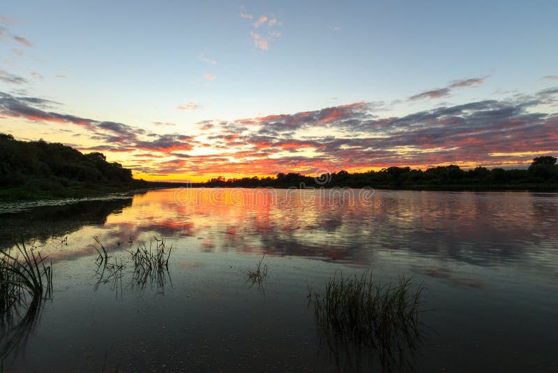 Scenic View of Beautiful Sunset Above the River at Summer Stock Photo ...