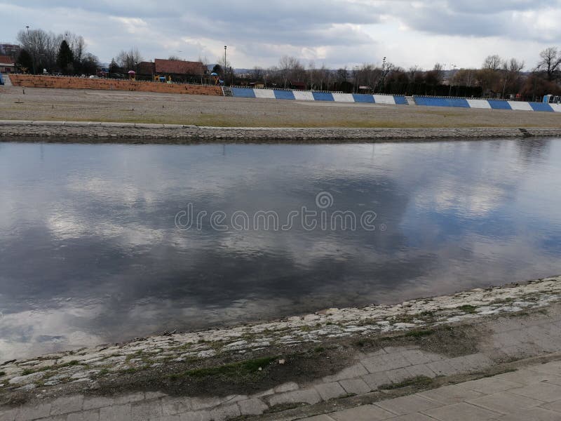 Scenic View of Boardwalk by the River Dock in the City Stock Image ...