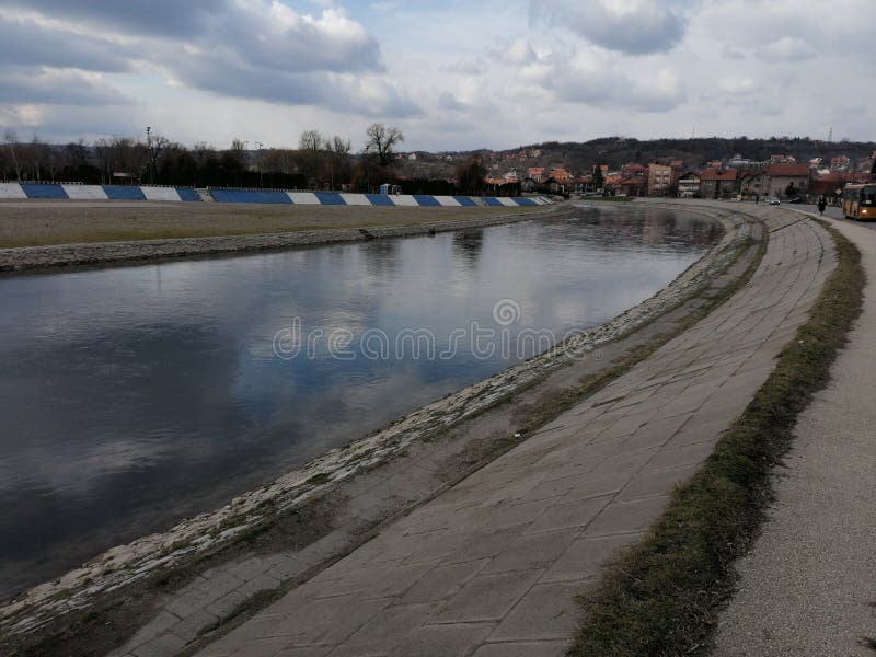 Scenic View of Boardwalk by the River Dock in the City Stock Photo ...