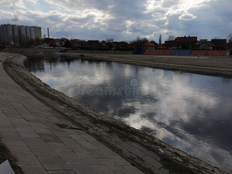 Scenic View of Boardwalk by the River Dock in the City Stock Photo ...