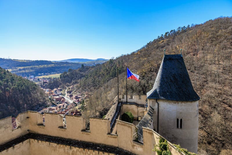 Scenic View of Castle Wall with Czech Flag and Village in Background ...