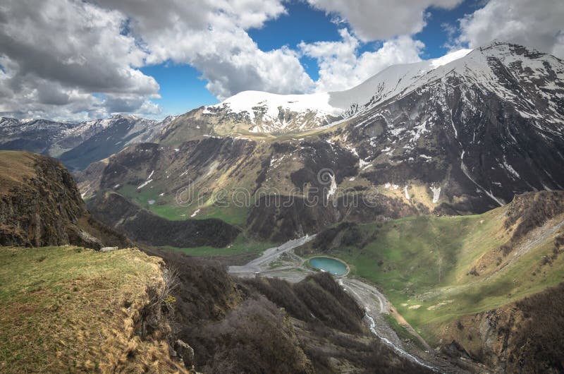 Scenic View on Caucasus Mountains in Georgia. a Small River Flows Down ...