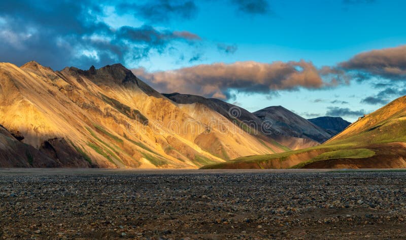 Scenic View of Colorful Rhyolite Mountains, Under a Dramatic Sky during ...