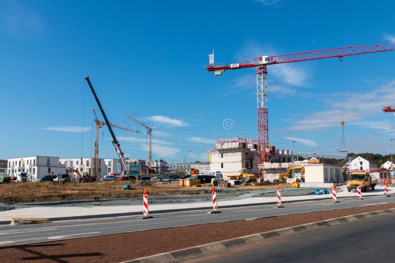 Scenic View of a Crane Working in a Construction Zone with a Cloudy Sky ...