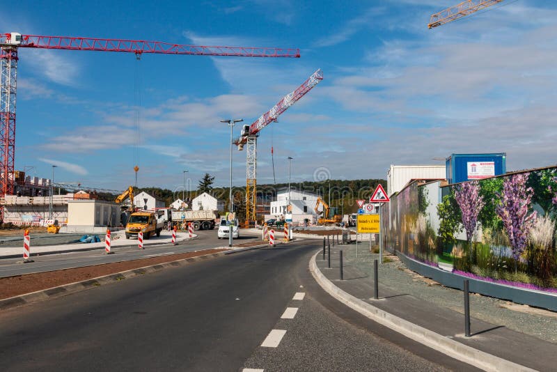 Scenic View of a Crane Working in a Construction Zone with a Cloudy Sky ...
