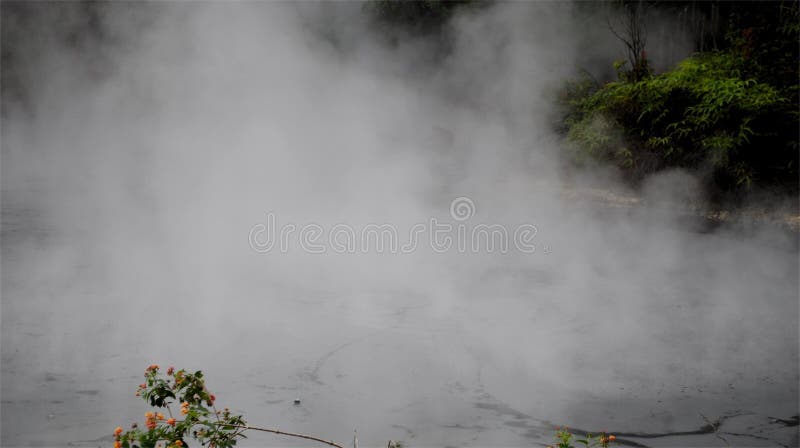 Scenic View of Crater Smoke Stock Photo - Image of forest, mist: 353630026