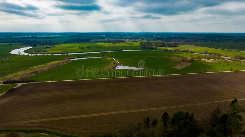 Scenic View of a Farm Next To a River. Stock Image - Image of ...