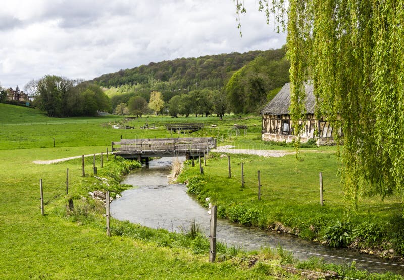 Scenic View on the French Spring Countryside with River and Bridge ...
