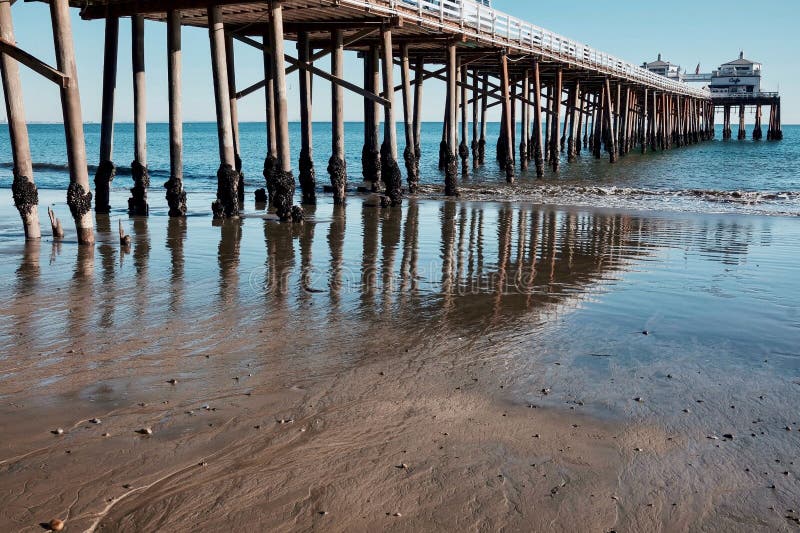 Scenic View of Malibu Pier Reflecting on the Sandy Beach Stock Image ...