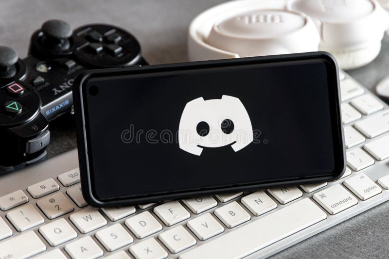 Discord Logo on Smart Phone Screen on Table Editorial Photography ...