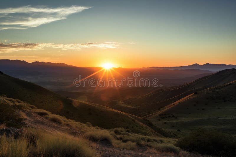 Scenic View of Mountain Range with the Sun Setting in the Distance ...
