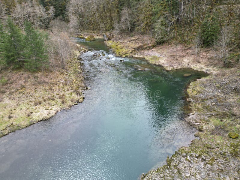 Scenic View of a Natural Stream Flowing Down a Hillside, Surrounded by ...