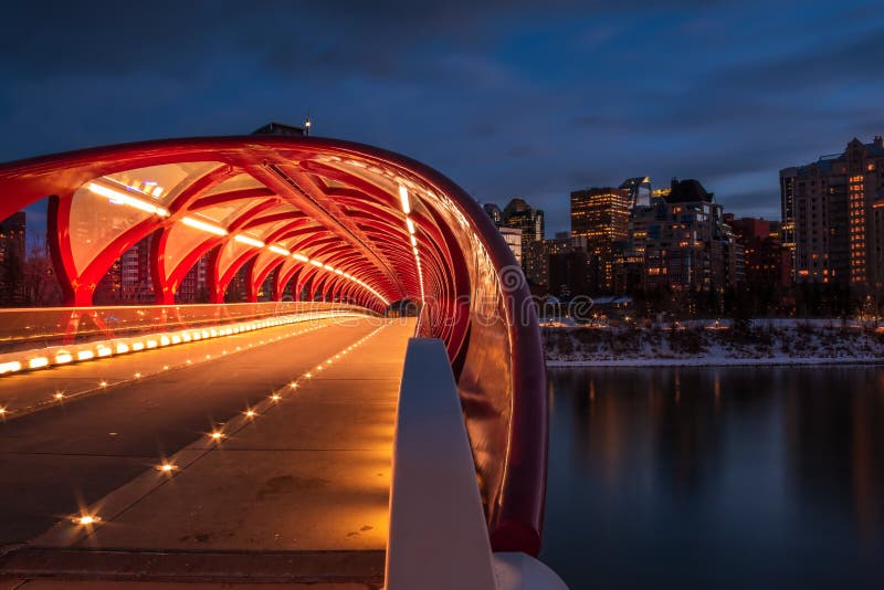 Peace Bridge Glowing at Night Editorial Photo - Image of buildings ...