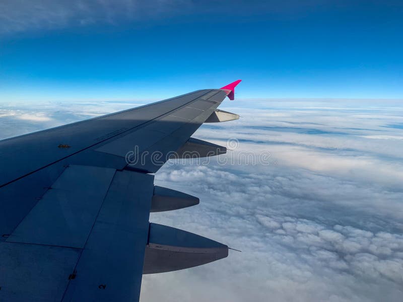 Scenic View of a Plane Wing High Above the Sky Stock Image - Image of ...