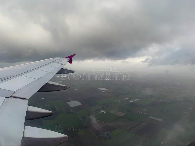 Scenic View of a Plane Wing High Above the Sky Stock Photo - Image of ...