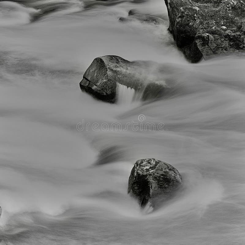 Scenic View of a River with Jutting Rocks in Grayscale Stock Image ...