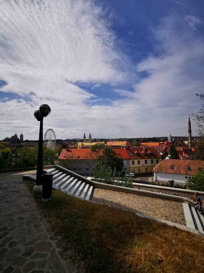 Scenic View of Rooftops and Landmarks from a Hillside Path in Prague ...